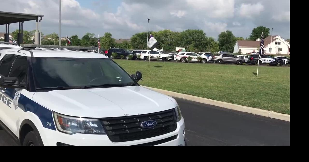 Police cars for the procession for Elwood Officer Shahnavaz ...