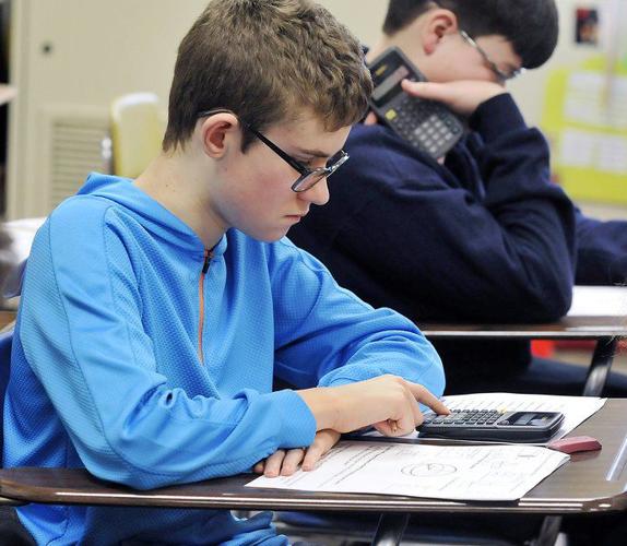 Alexandria sixth-grader Lukas Sullivan takes pre-algebra at junior high ...