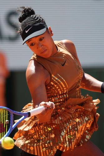 Naomi Osaka’s sequined gold dress at the French Open reminds her of the ...