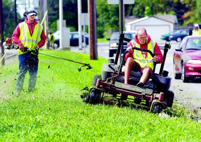 Summer mowing crew keeps the city looking nice for less | News ...