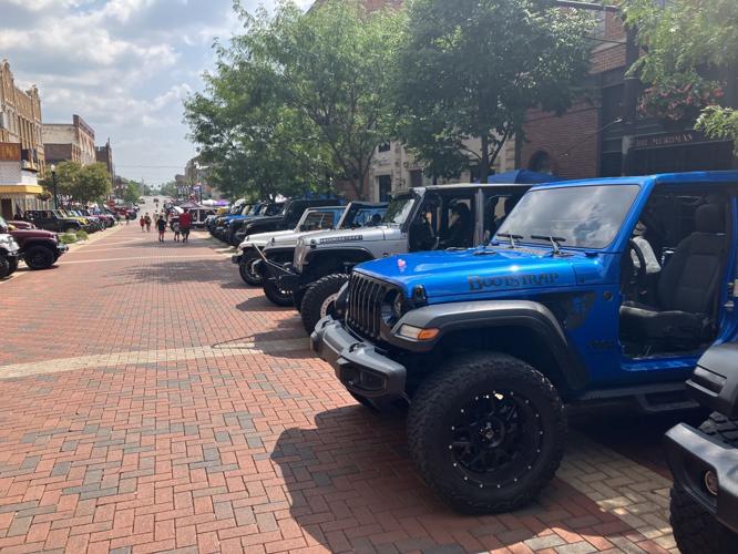Jeeps take over Meridian Street to raise funds for Humane Society, APL ...