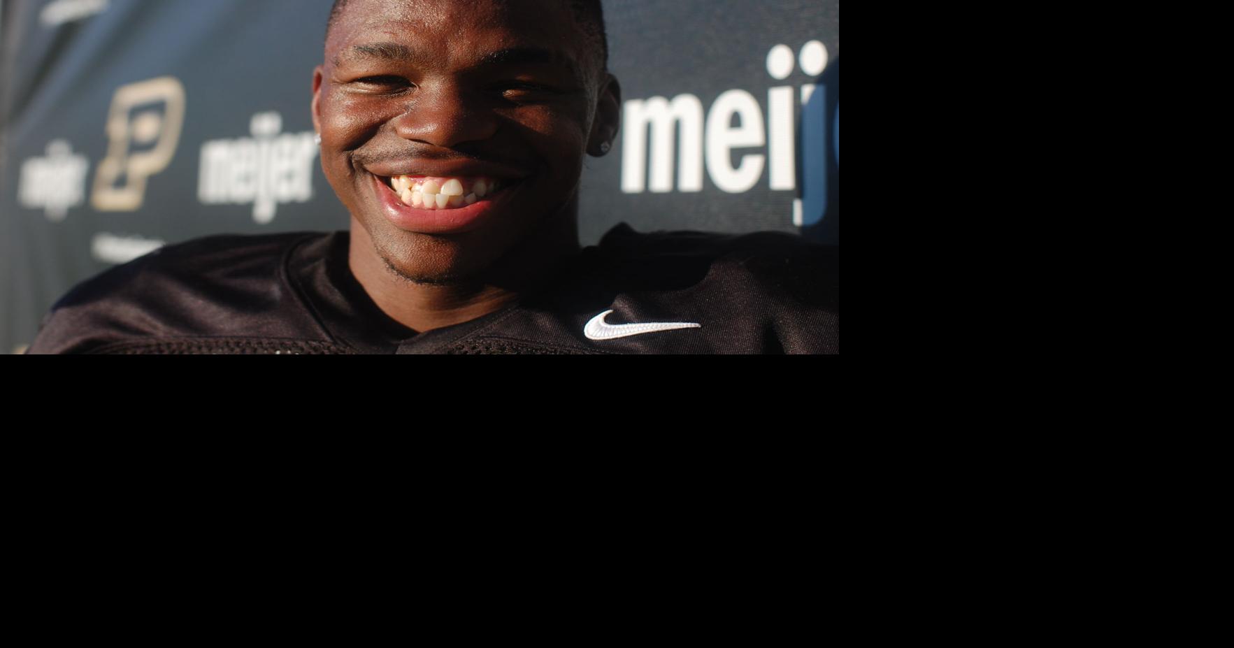 The kid behind the smile: Tario Fuller weathered a rough childhood to ...