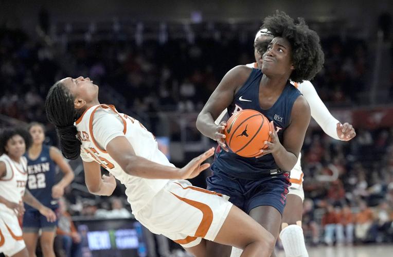 Booker's 17 points, 10 rebounds pace No. 4 Texas to an 81-63 win against Pennsylvania | National ...