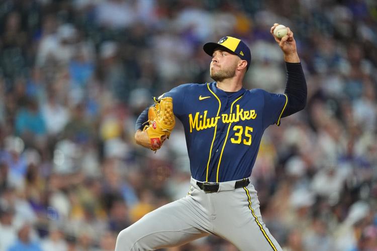 Brewers' Brian Fitzpatrick gets injured on warmup pitch in first ...