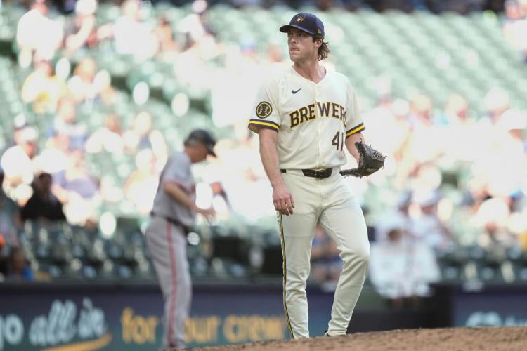 Brewers' Brian Fitzpatrick gets injured on warmup pitch in first ...