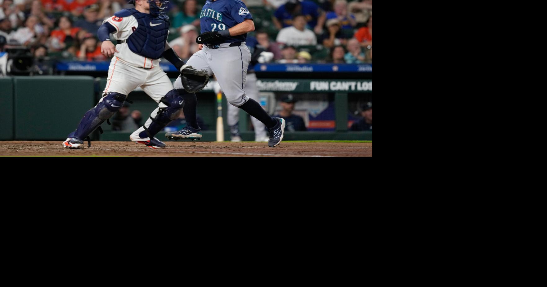 Cal Raleigh tried a full-uniform shower. The next night, his bat ...
