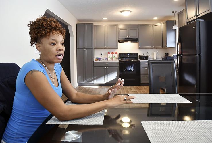 Harrison and her children celebrating Christmas in their new home ...