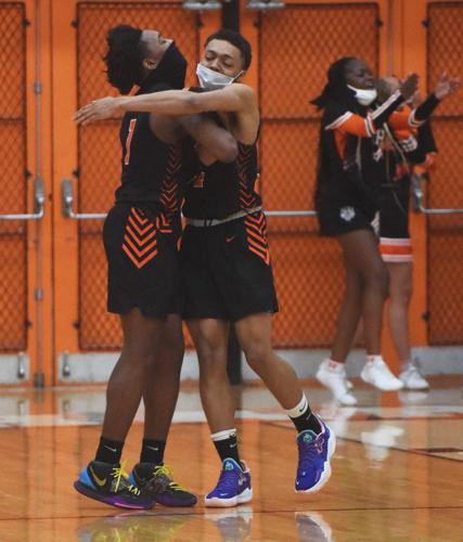 Singleton, Benton Harbor overcome Pullian's early absence to win ...