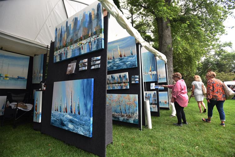 Host families, artists connect during Krasl Art Fair on the Bluff ...