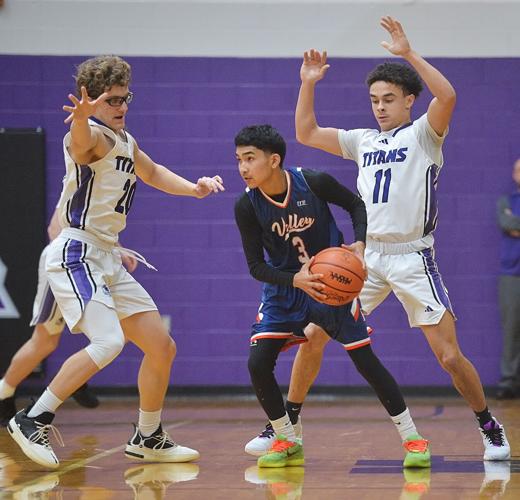 Michigan Lutheran boys roll past River Valley; Titan girls fall to ...