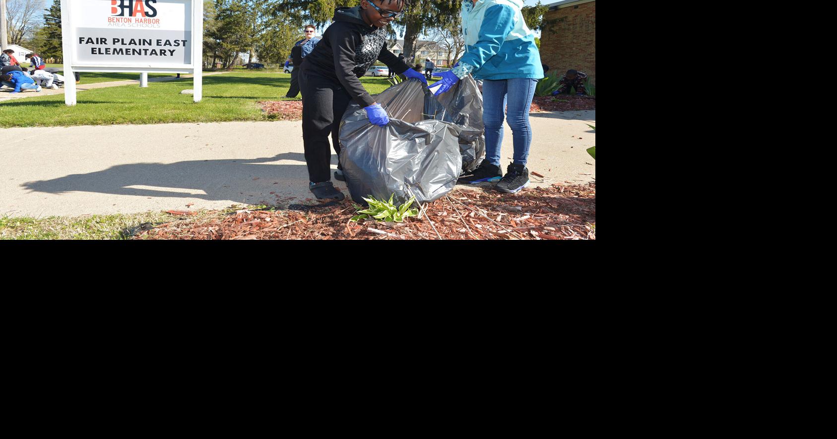 Fair Plain Elementary School students clean up grounds for Earth Day ...