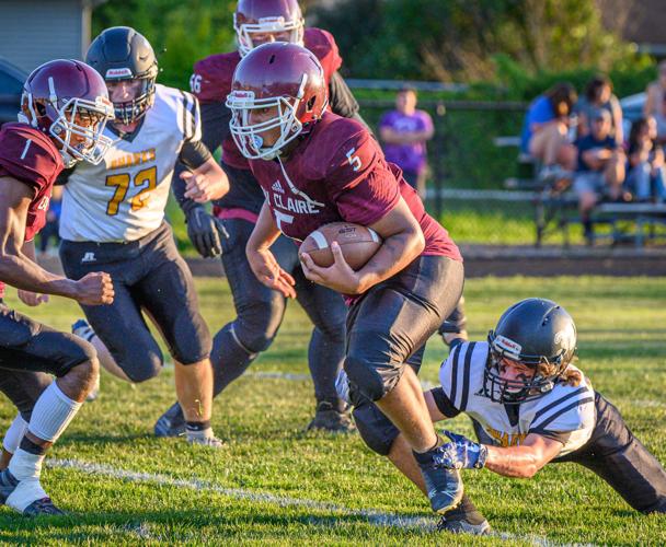 Holmes, Travis run wild for Eau Claire in victory over Twin City ...