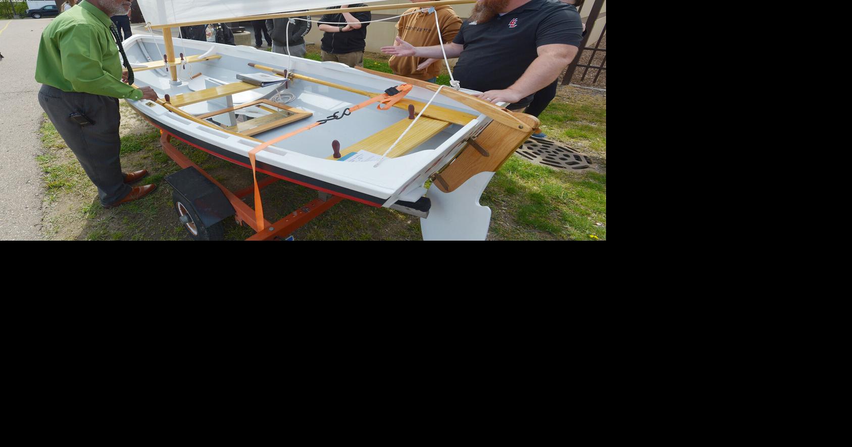 Lakeshore High School woodworking class names boat after student ...
