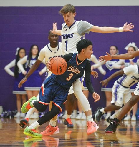 Michigan Lutheran boys roll past River Valley; Titan girls fall to ...