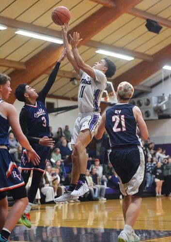 Michigan Lutheran boys roll past River Valley; Titan girls fall to ...