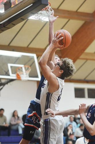 Michigan Lutheran boys roll past River Valley; Titan girls fall to ...