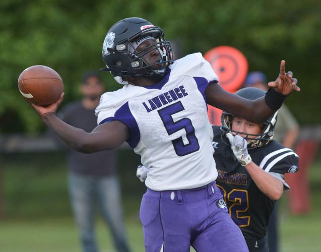 Bol Bak, Lawrence roll past Twin City Sharks in 8-man contest | Sports ...