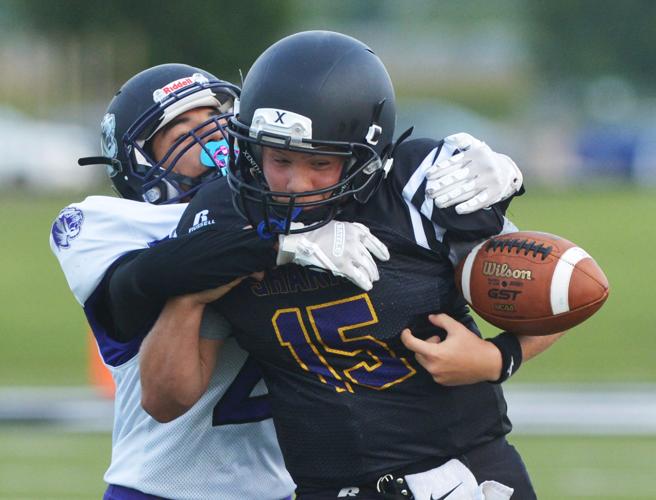 Bol Bak, Lawrence roll past Twin City Sharks in 8-man contest | Sports ...