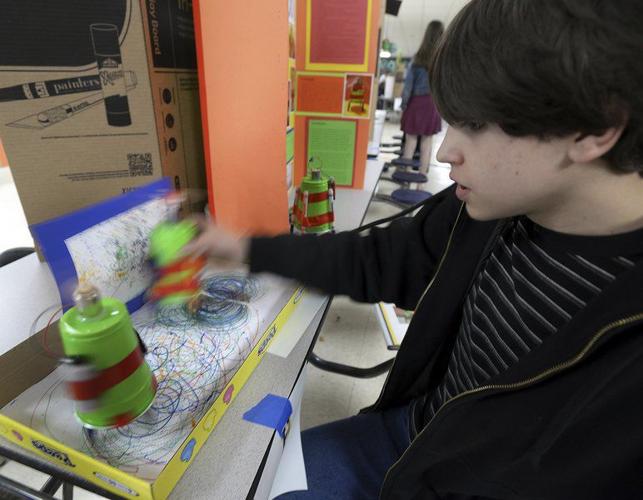 Crest vs. Colgate -- science fair examines toothpaste, robots ...