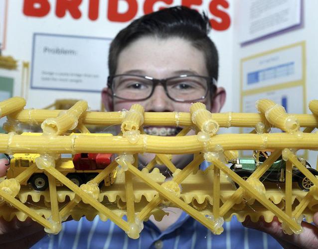 Crest vs. Colgate -- science fair examines toothpaste, robots ...