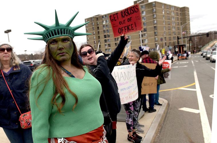 Protesters pack streets in push against Trump, Musk | Local News ...