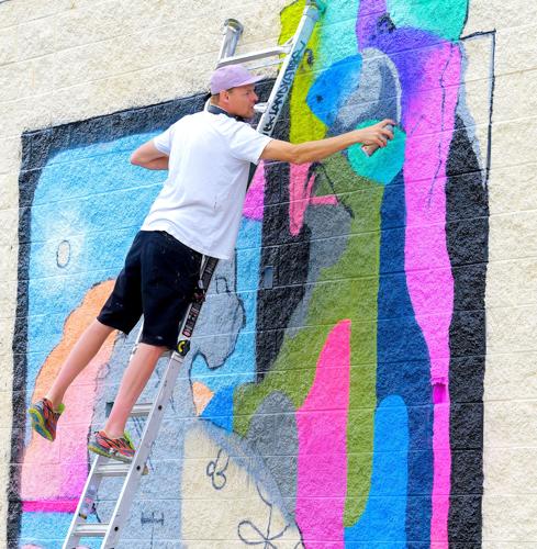 'The Dog in Art:' Funds for new Cache Humane Society mural raised by ...