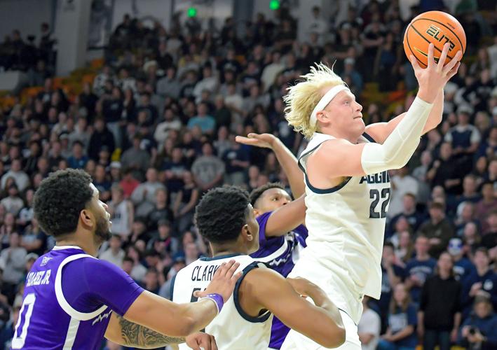 USU men’s basketball: Aggies hold off Wildcats to stay perfect on ...