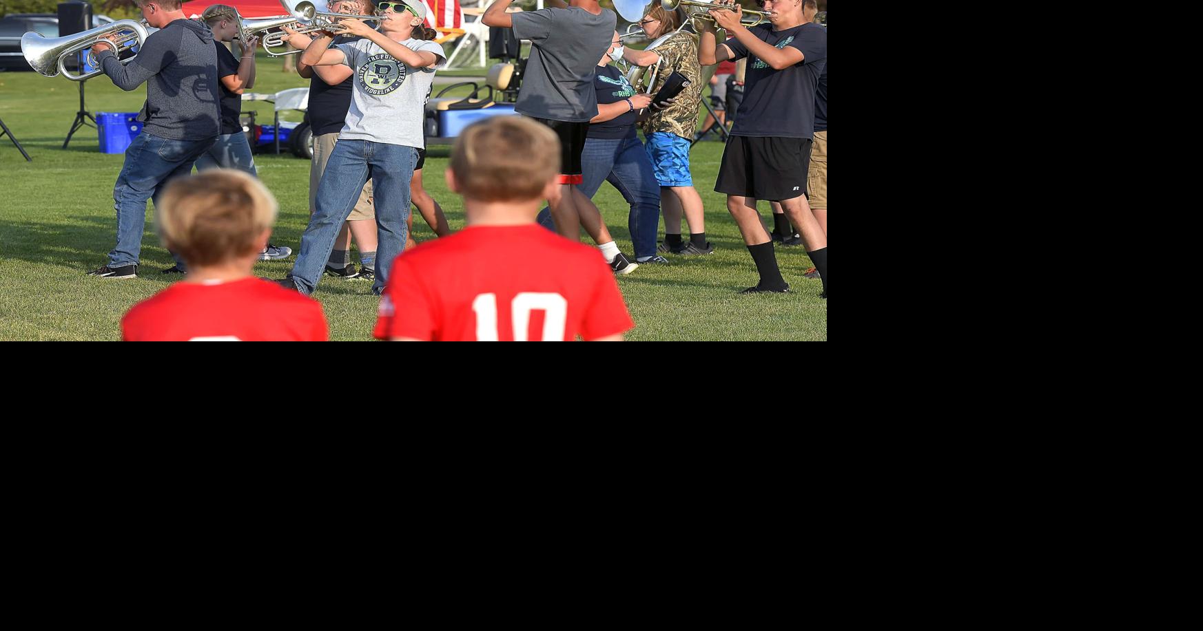 With a flash & a band: RHS Marching Band pulls surprise halftime ...