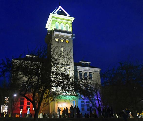 Old Main rainbow: USU students light building in rainbow colors in ...