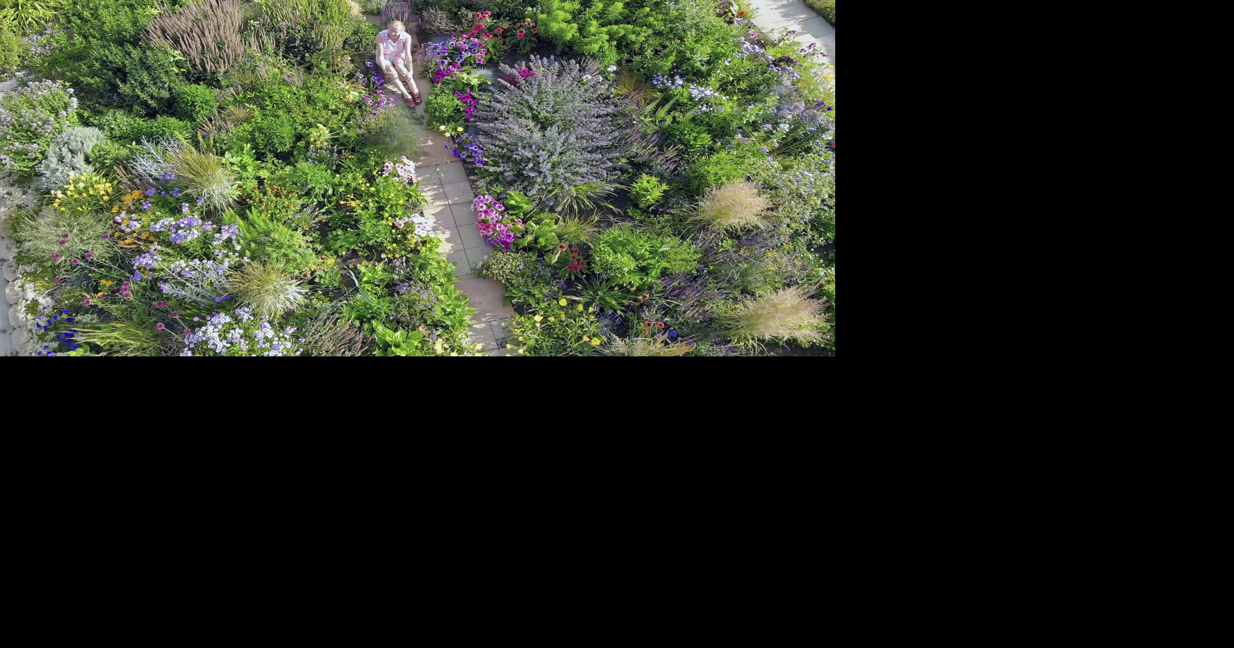Logan resident draws attention, bees with garden | Local News | hjnews.com