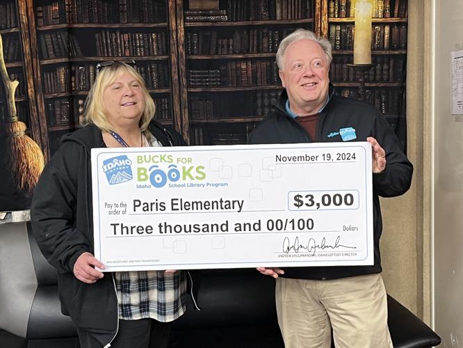 Idaho Lottery Commission presents $3,000 check, box of new books to ...