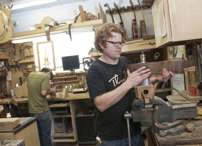 Local craftsman Ryan Thorell is known for creating fine guitars ...