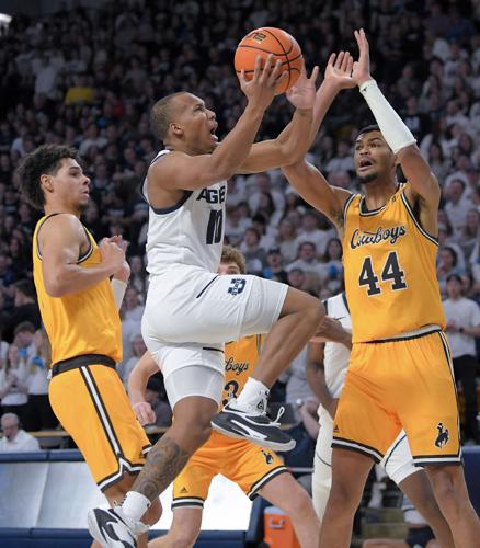 USU men's basketball: Fans show up, Aggies rolled to 14th straight win ...