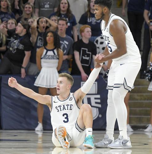 Photo Gallery: Utah Tech-Utah State Basketball | Multimedia | hjnews.com