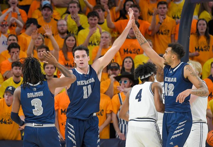 USU men’s basketball: Aggies suffer rare home loss against Wolf Pack ...