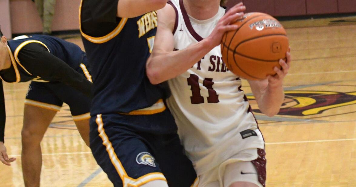 Prep boys hoops: Pirates struggle late, fall to Trojans in district ...