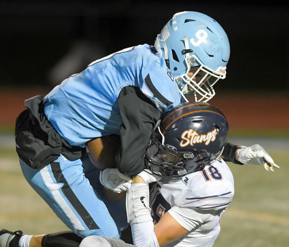 Prep football: A tale of two halves as Bobcats roll past Mustangs ...