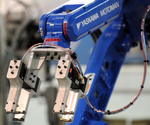 Robotic résumés: Utah lt. governor, students tour Autoliv factory to ...