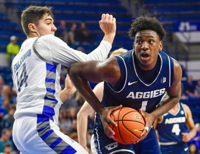 USU men's basketball: Aggies blast Falcons on road in MW opener | USU ...