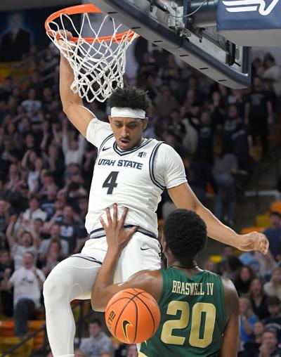 USU men’s basketball: Aggies break century mark again, thump 49ers ...