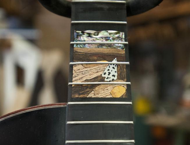 Local craftsman Ryan Thorell is known for creating fine guitars ...