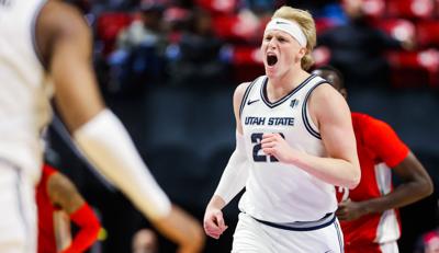 USU men’s basketball: Aggies come up short in MW semifinals after big ...