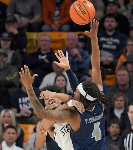 USU men’s basketball: Aggies suffer rare home loss against Wolf Pack ...