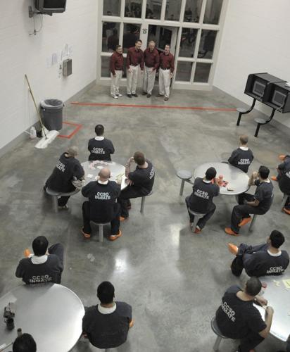 Harmony behind bars: Barbershop group cheers inmates with holiday songs ...