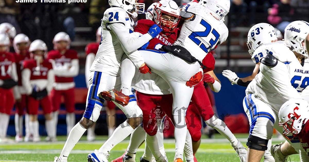 Tewksbury’s Ben Christopher (1) moves the chains after finding a seam ...