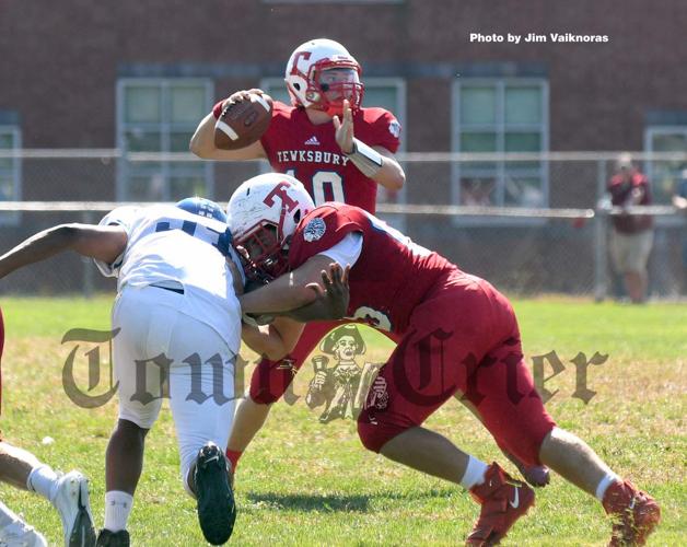 Football team defeats North Andover, 34-20, now 3-1: Redmen run away ...