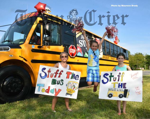 Tewksbury rallies for school supply drive, “Stuff the Bus” | News ...