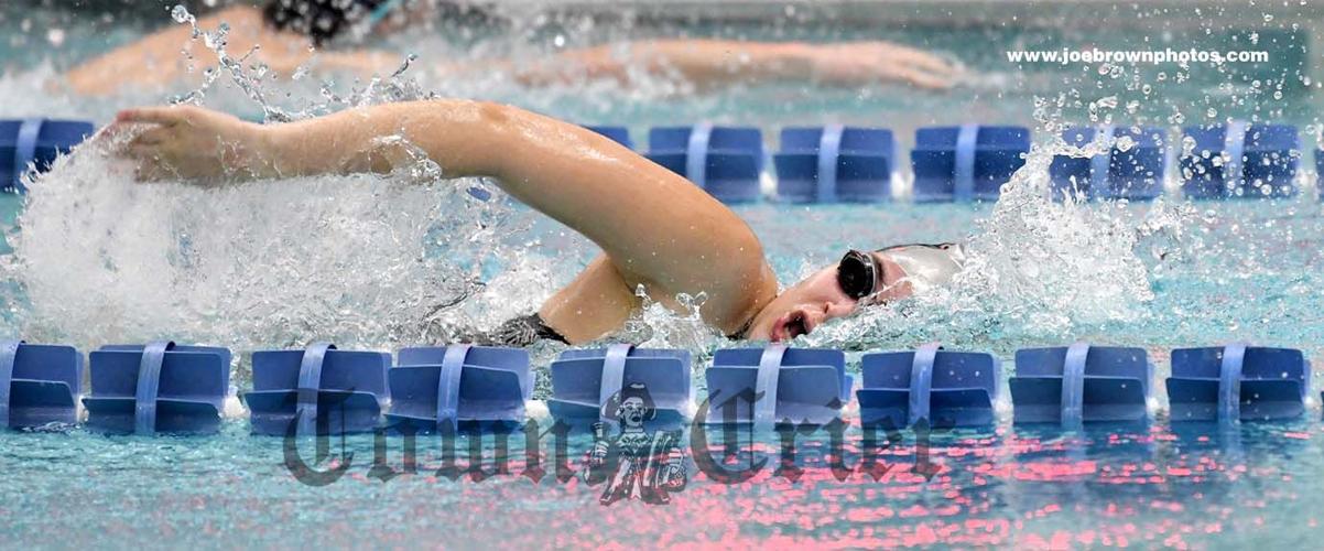 First Wilmington resident to complete all four years in swim program ...