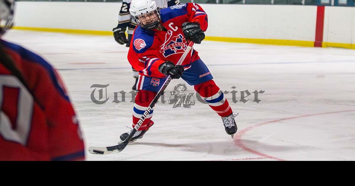 Emma Giordano of Tewksbury/Methuen takes a shot on goal against Acton ...