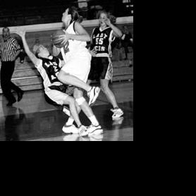 A KEY PLAY. Mt. Carmel's Amanda Sundstrom took a charge by Princeton's ...